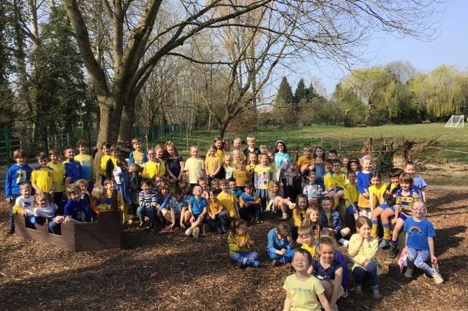 Pupils don yellow and blue to raise funds for Ukraine ...