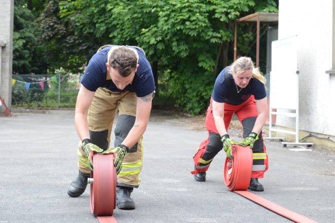Rolling hoses for firefighters’ charity | monmouthshirebeacon.co.uk
